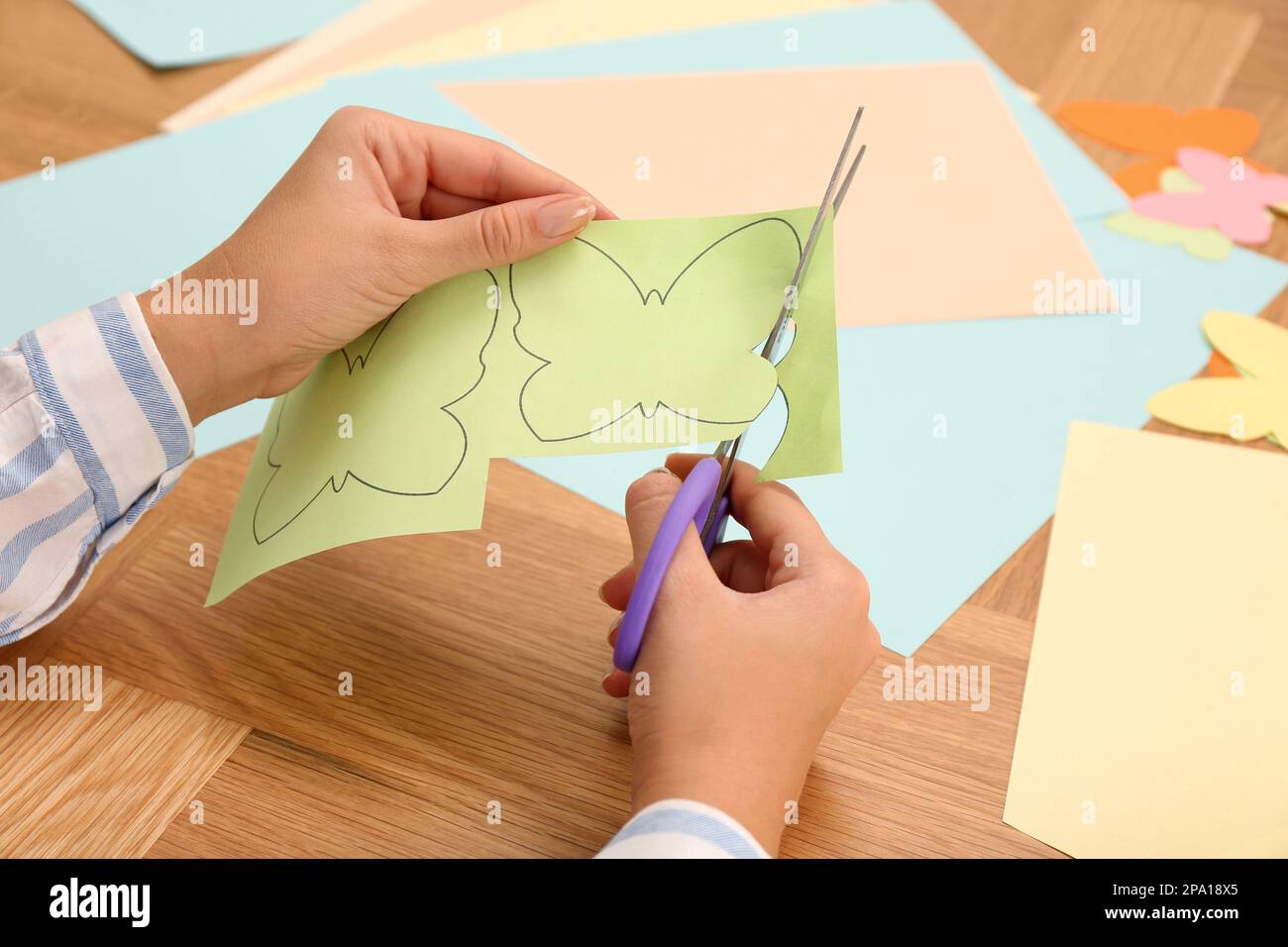 Butterfly shape with hands hi-res stock photography and images - Alamy