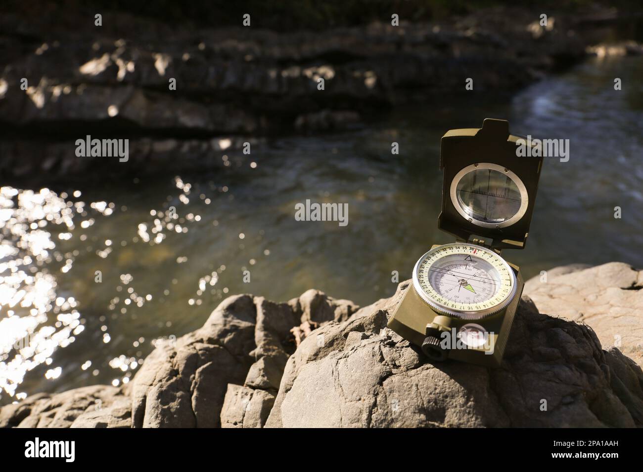 Compass on rock hi-res stock photography and images - Alamy