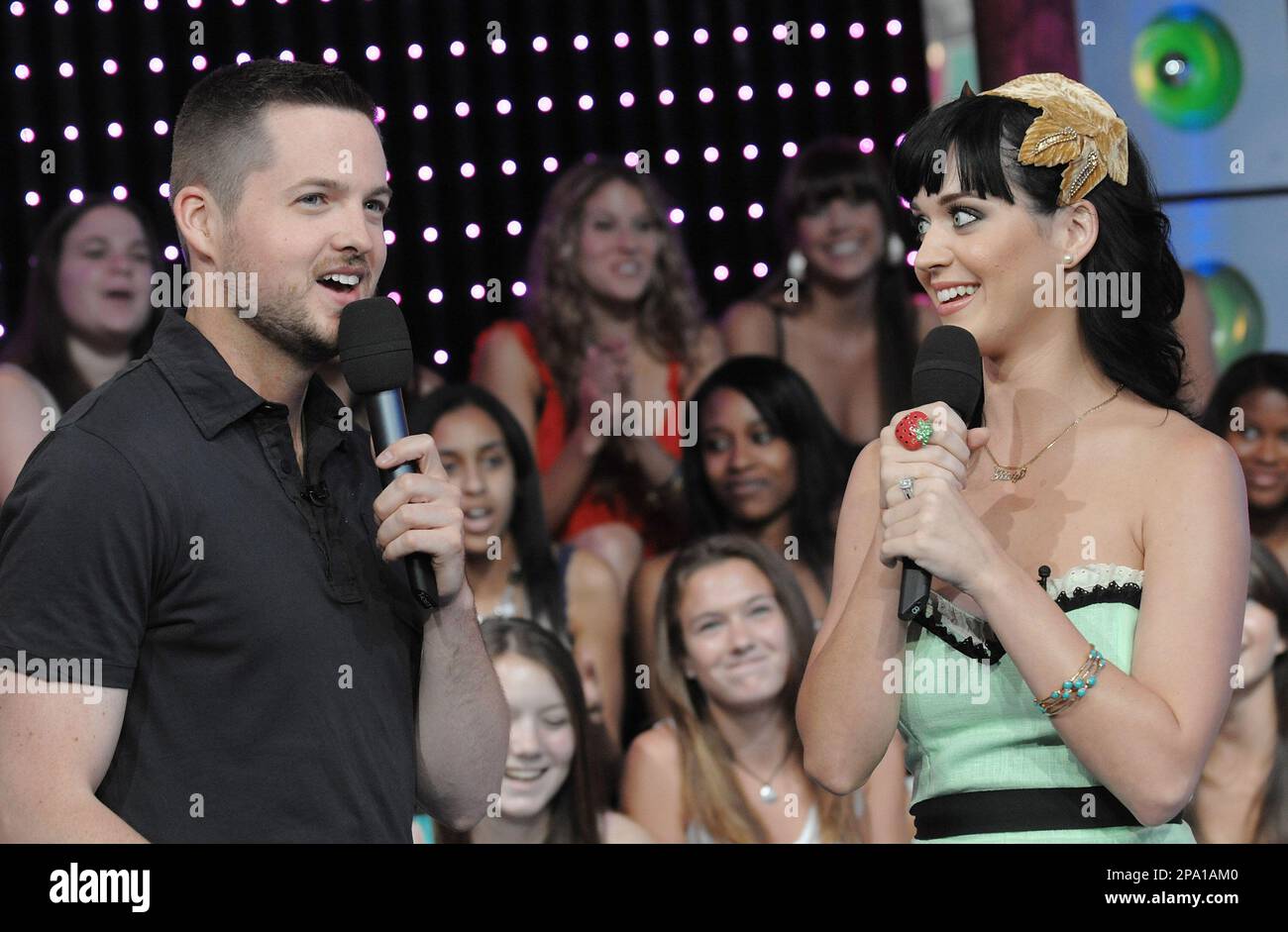 Singer Katy Perry, right, talks with VJ Damien Fahey during an ...