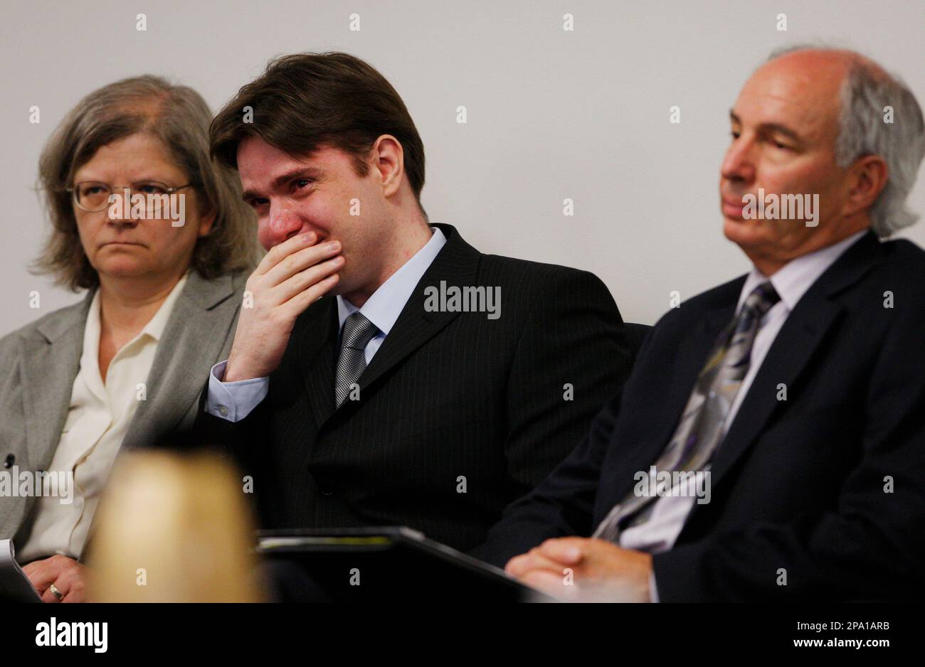 Defendant Neil Entwistle, center, with his defense attorneys Stephanie ...