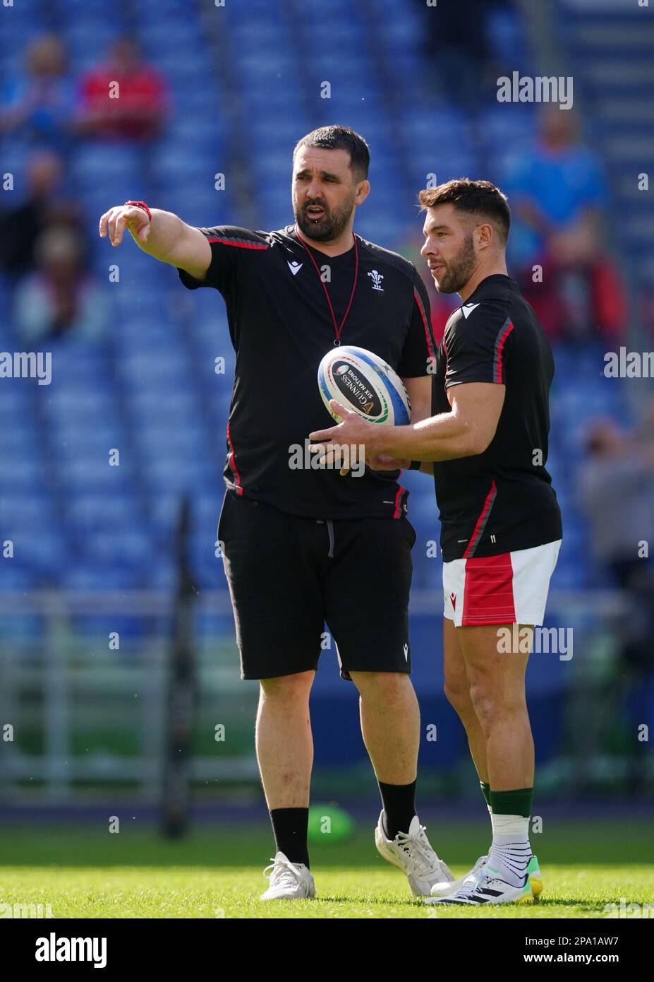 Wales' assistant coach Jonathan Thomas (left) and Wales' Rhys Webb on ...