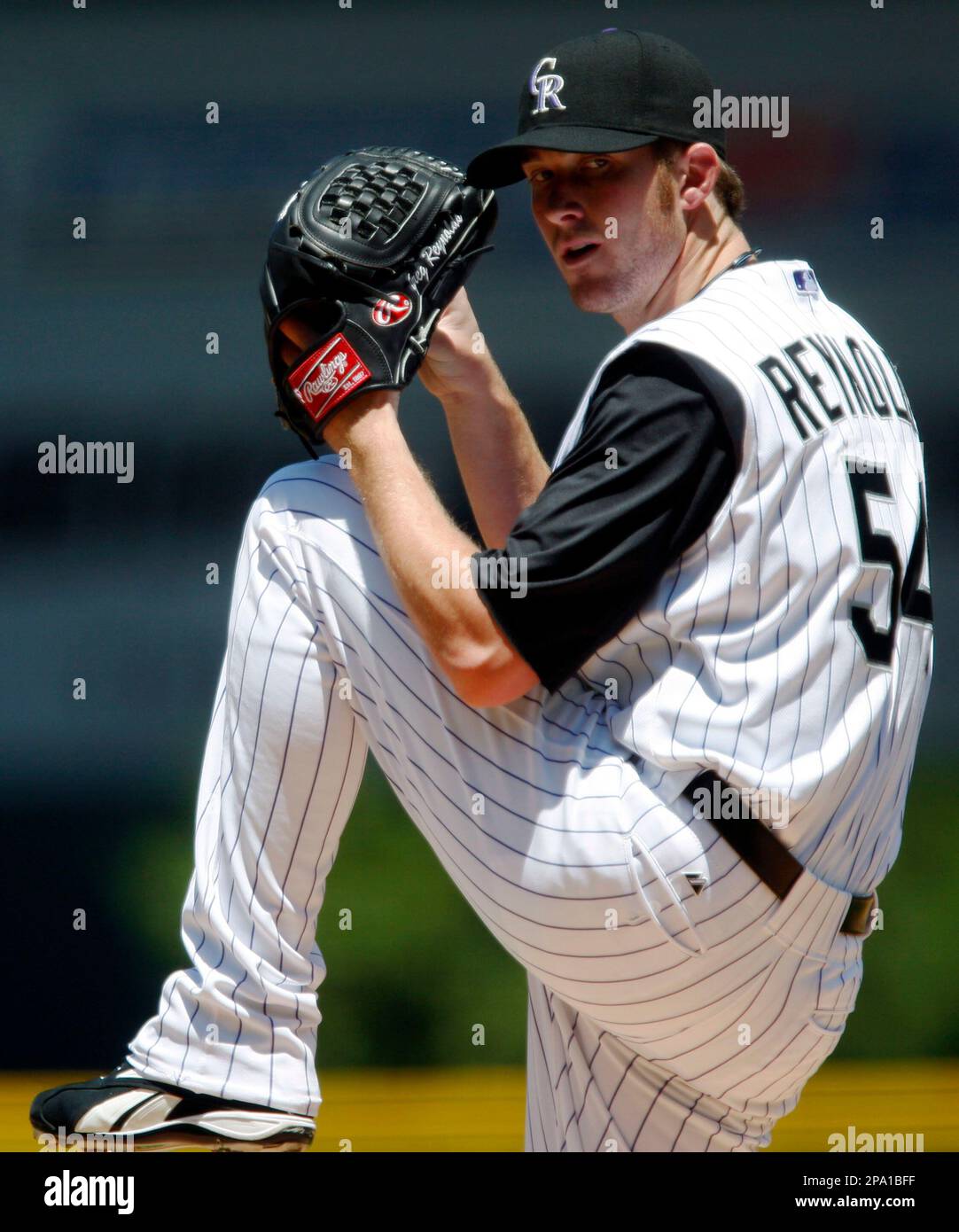 Colorado Rockies starter Greg Reynolds delivers a pitch to San ...