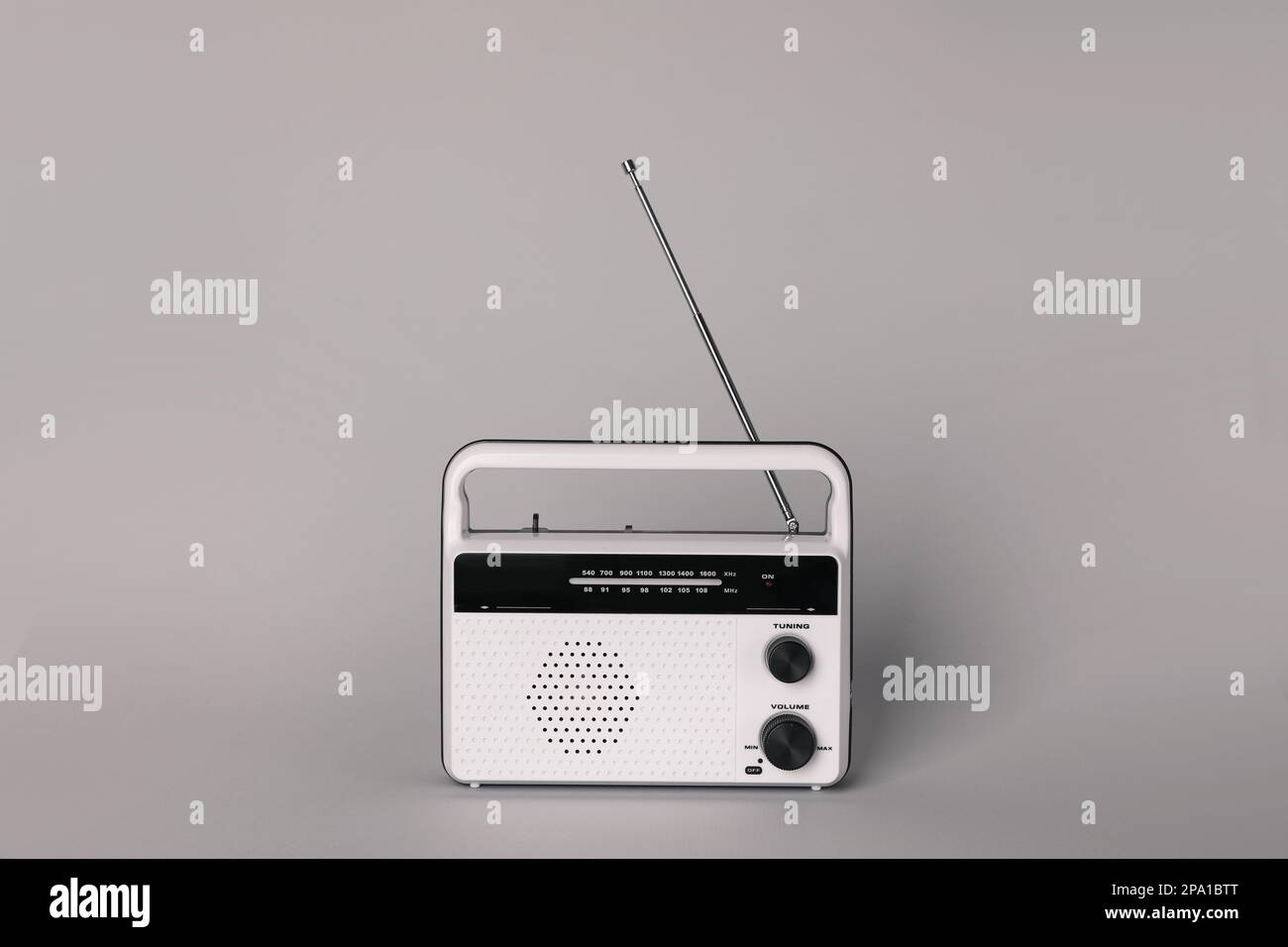 Portable retro radio receiver on grey background Stock Photo - Alamy