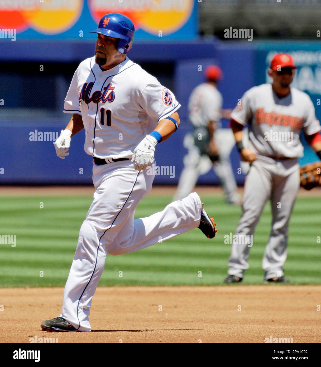 New York Mets Ramon Castro (11) trots past Arizona Diamondbacks ...