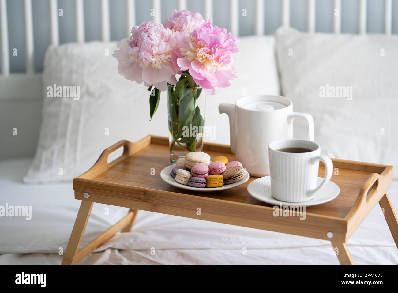 Tray with breakfast on bed Stock Photo - Alamy