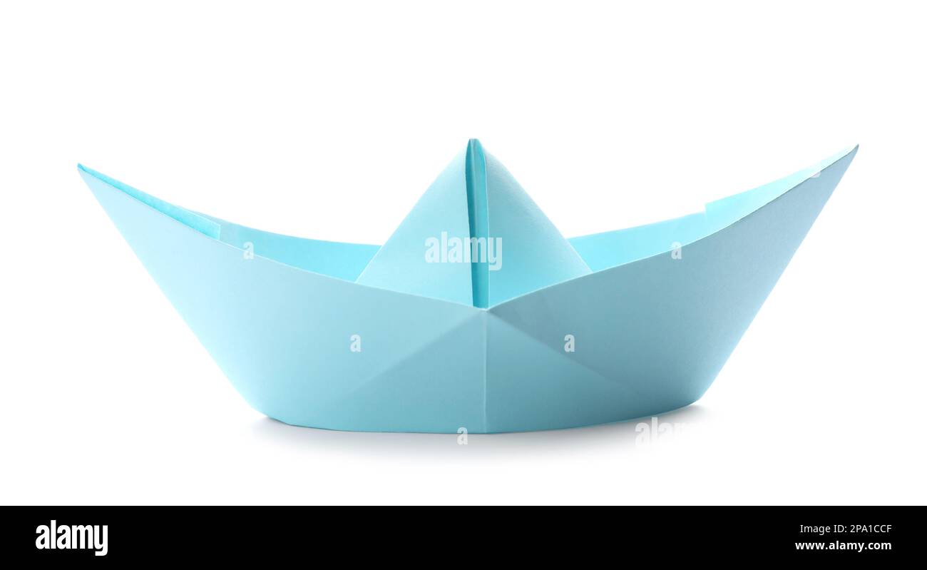 Handmade light blue paper boat isolated on white. Origami art Stock ...