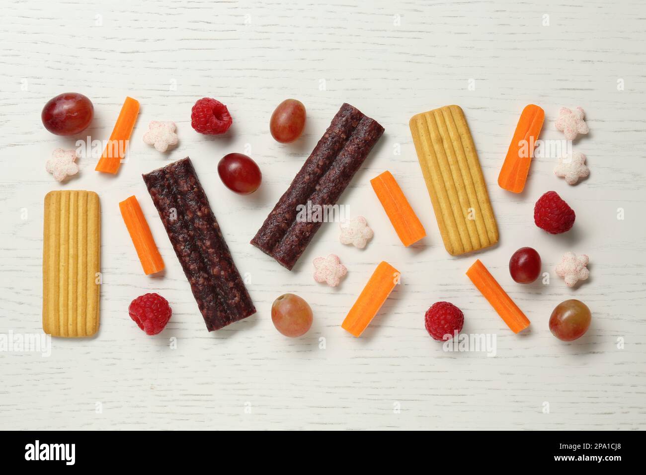 Flat lay composition with different finger foods for baby on white ...