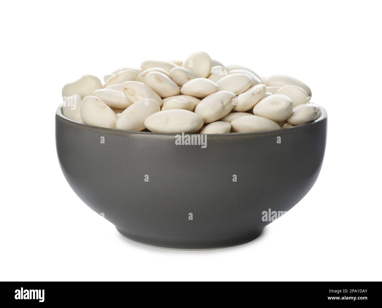 Bowl of uncooked navy beans isolated on white Stock Photo - Alamy