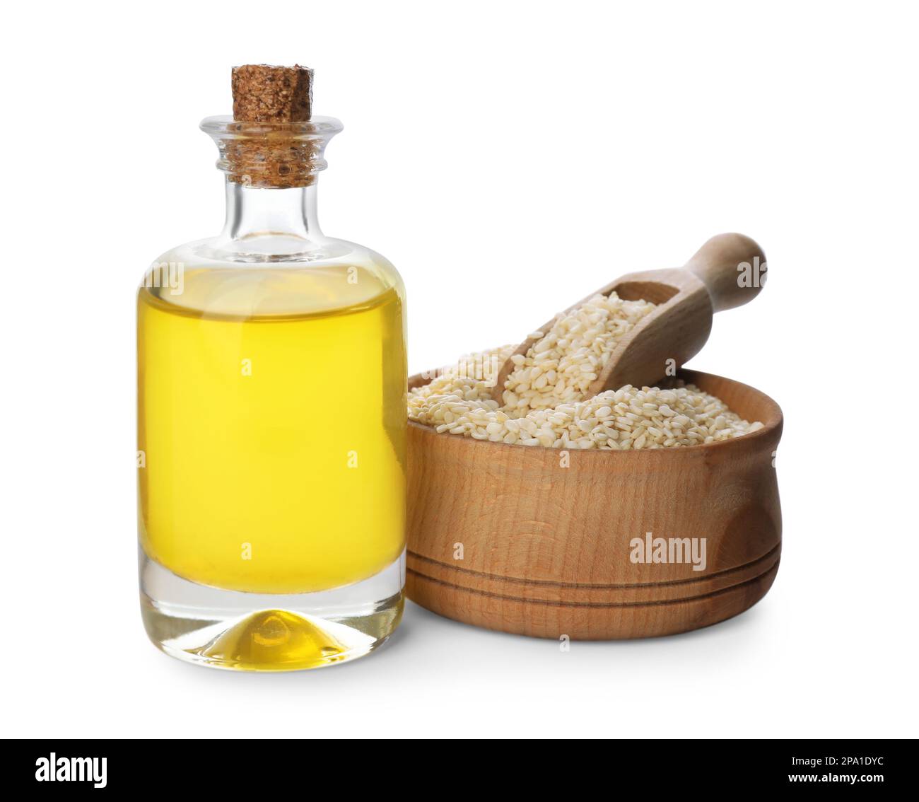 Fresh sesame oil and seeds on white background Stock Photo - Alamy