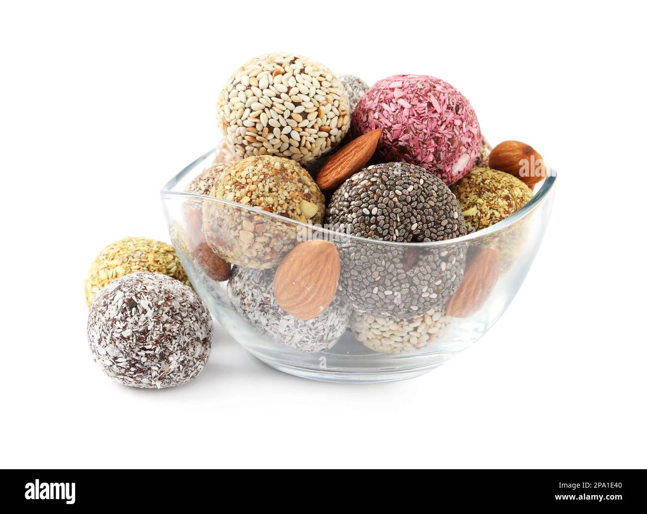 Different Delicious Vegan Candy Balls With Almonds On White Background
