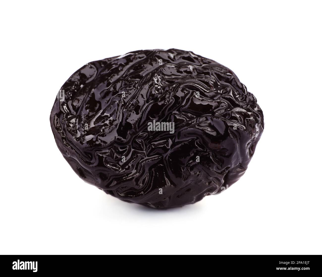 One sweet dried prune isolated on white Stock Photo - Alamy