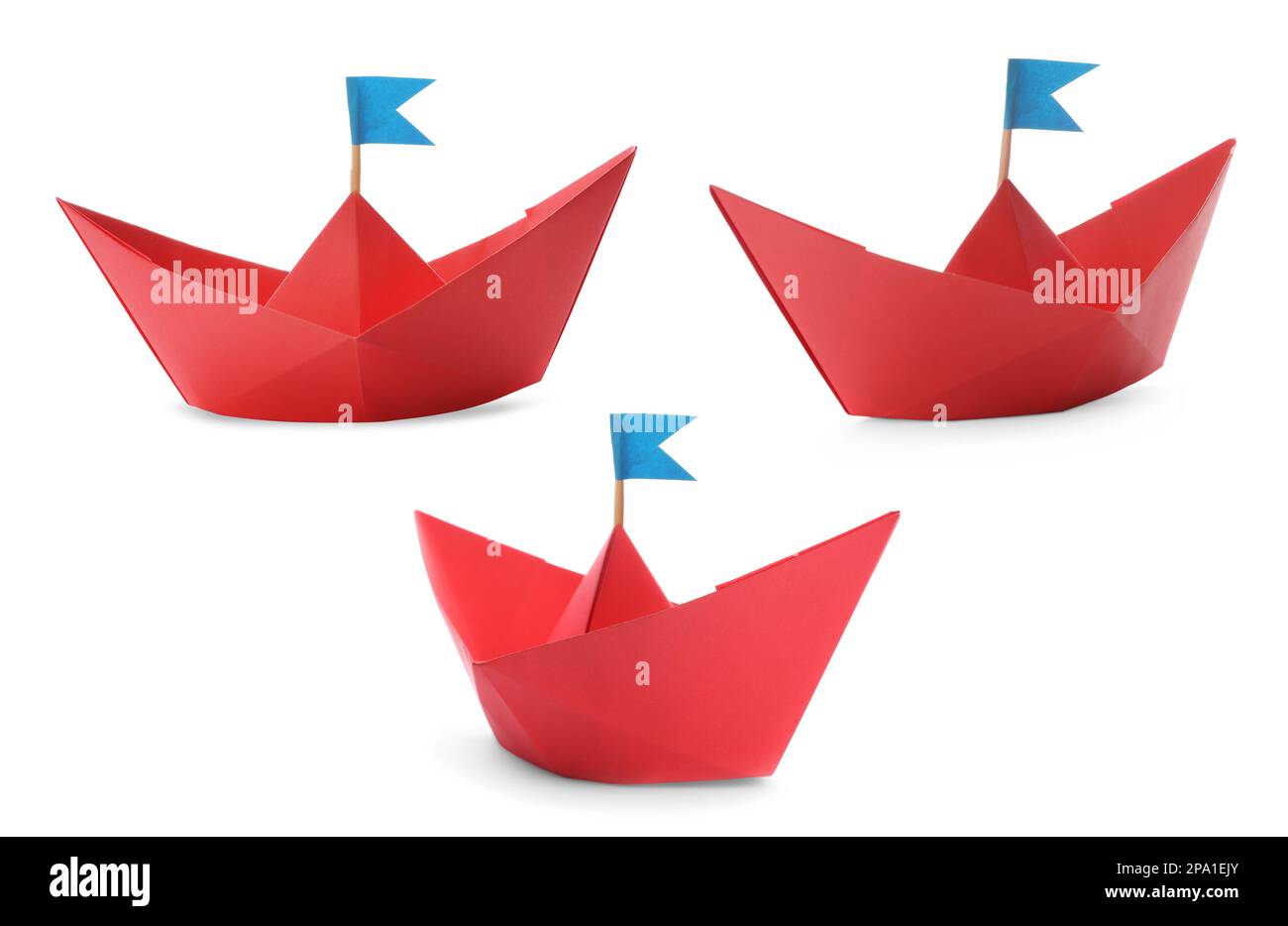 Red paper boats with kight blue flags on white background, collage ...