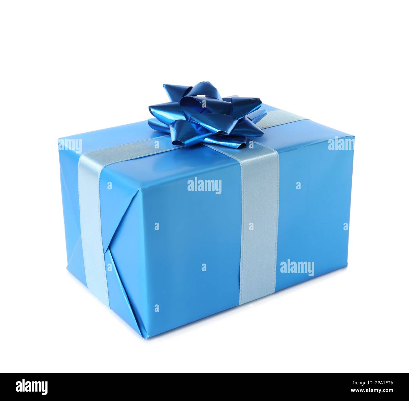 Beautifully wrapped gift box with blue bow isolated on white Stock ...