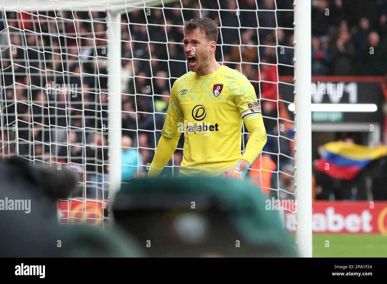 Bournemouth goalkeeper Neto celebrates after Liverpool's Mohamed Salah ...