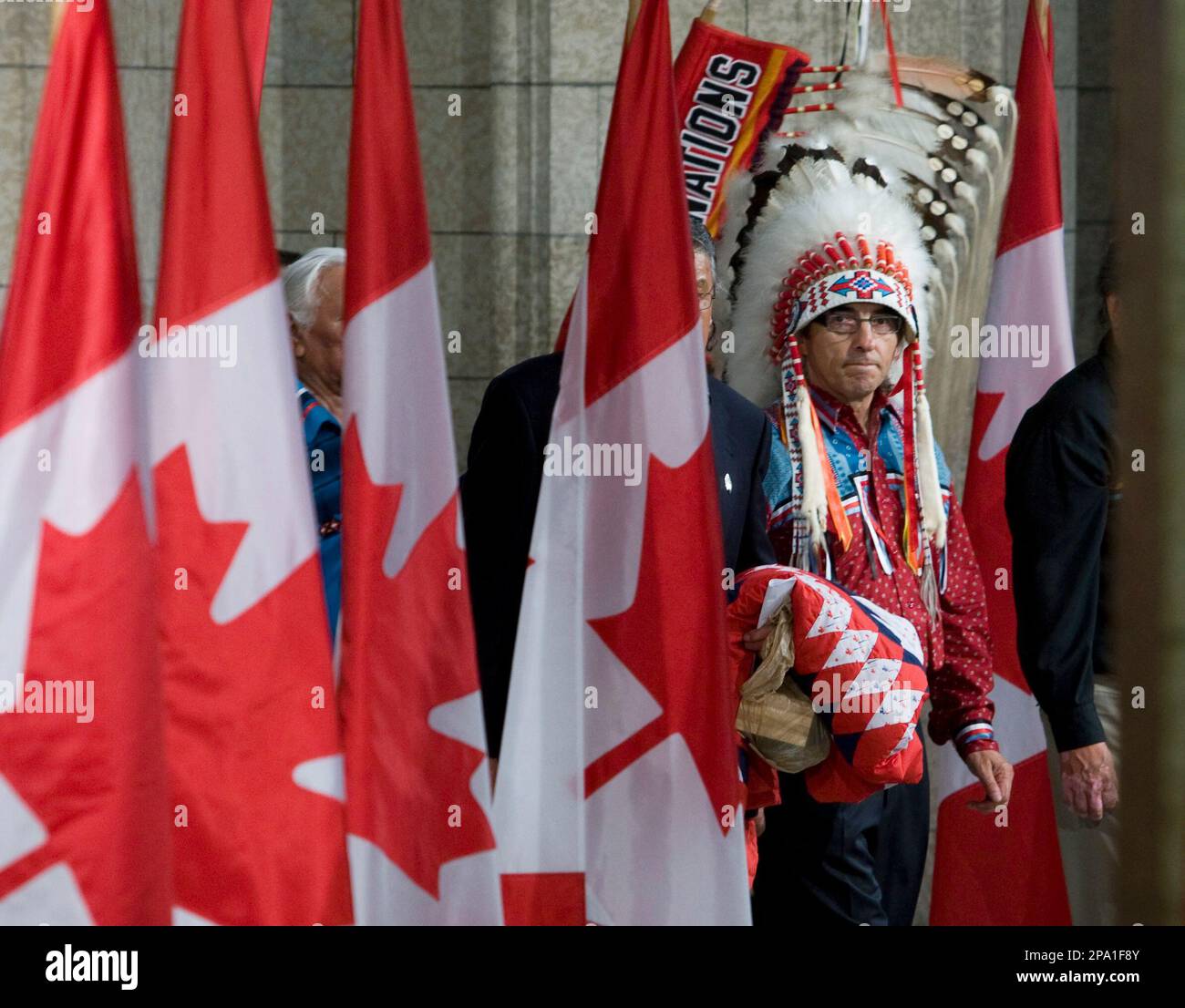 Assembly of First Nations Chief Phil Fontaine makes his way to a ...
