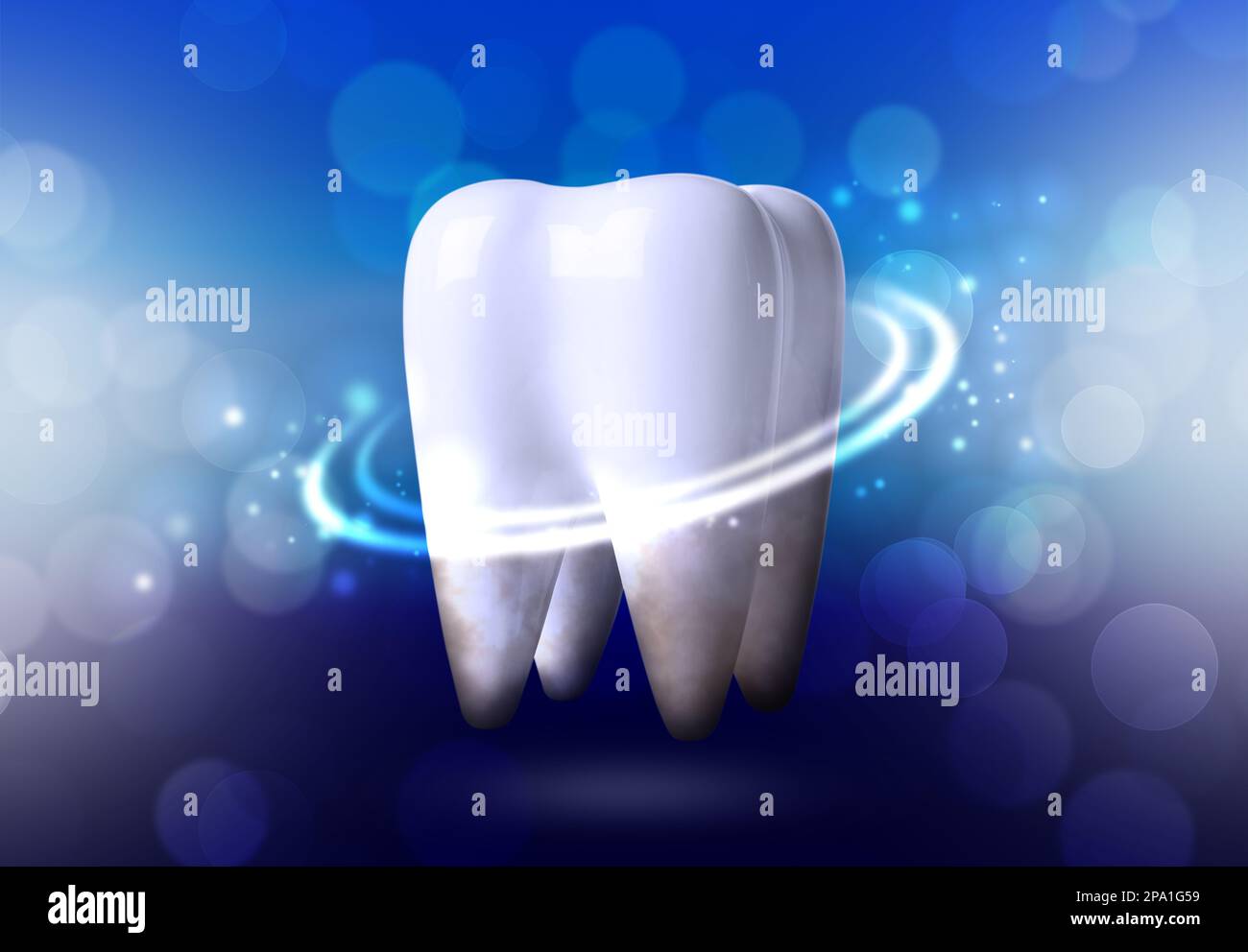 Tooth model with glowing on blue background, bokeh effect. Dental care ...