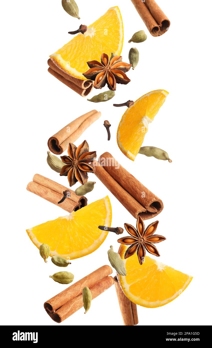 Pieces of fresh orange, aromatic anise stars, cinnamon, cloves and ...