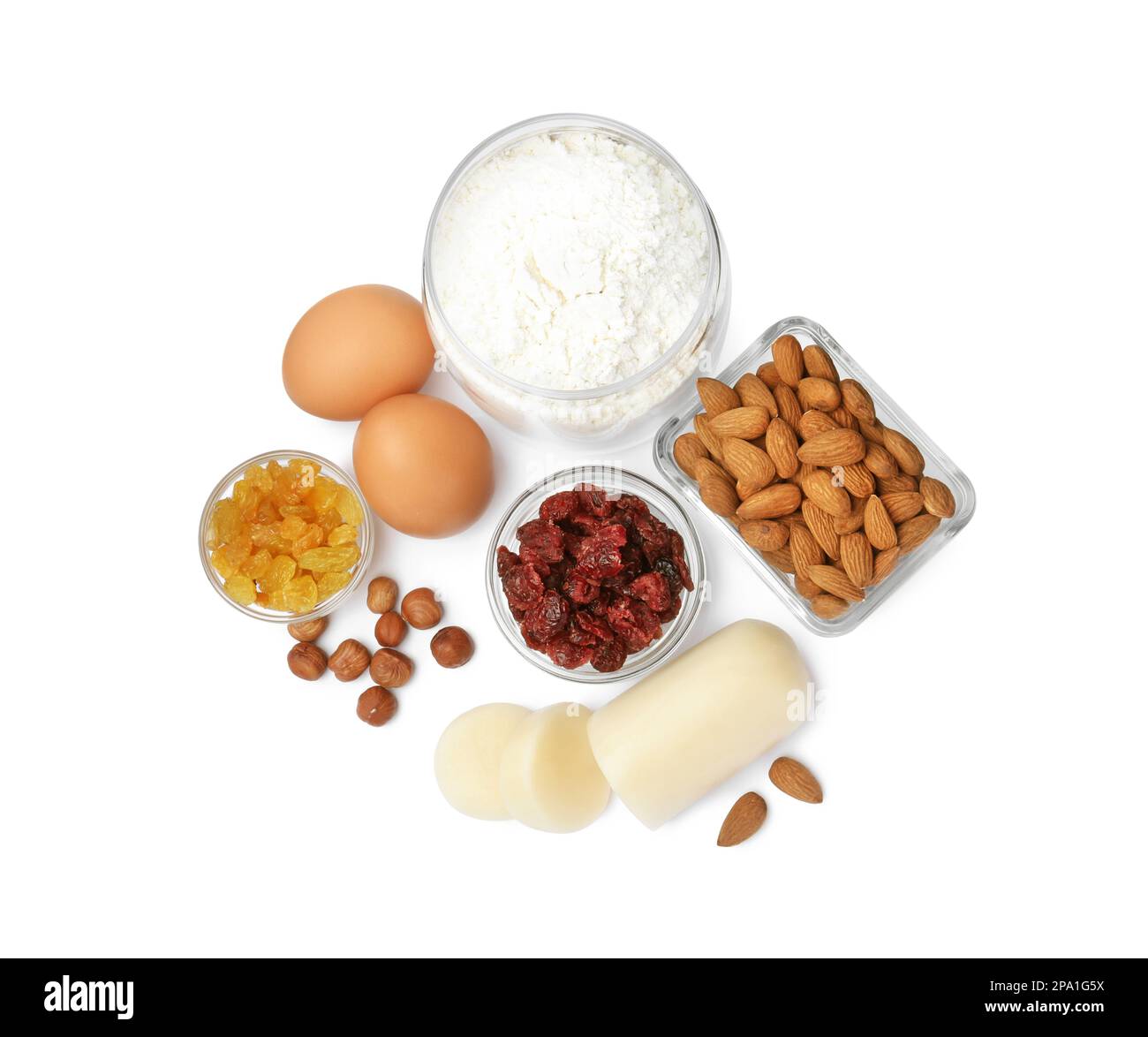 Marzipan and other ingredients for homemade Stollen on white background ...