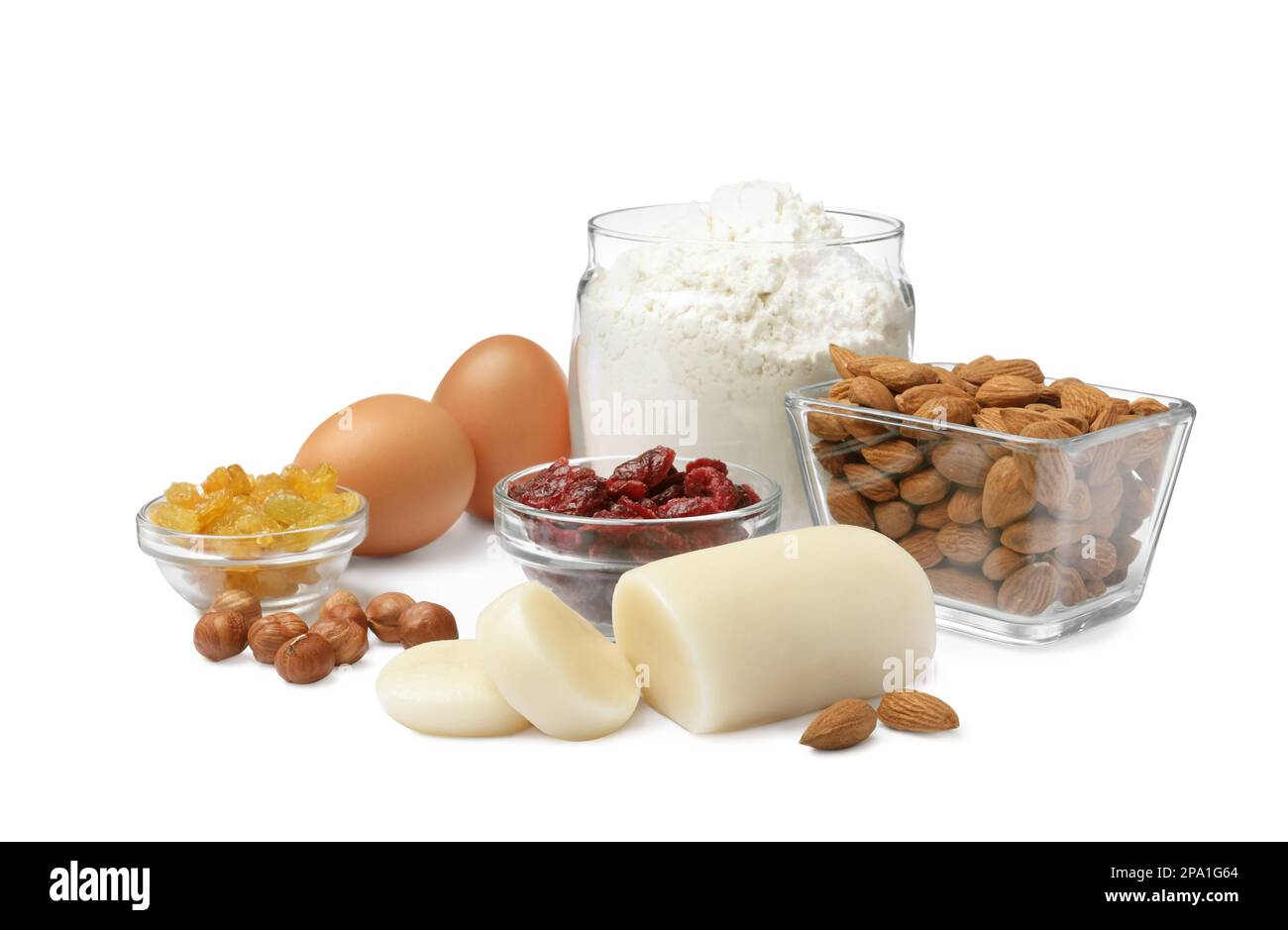 Marzipan and other ingredients for homemade Stollen on white background ...