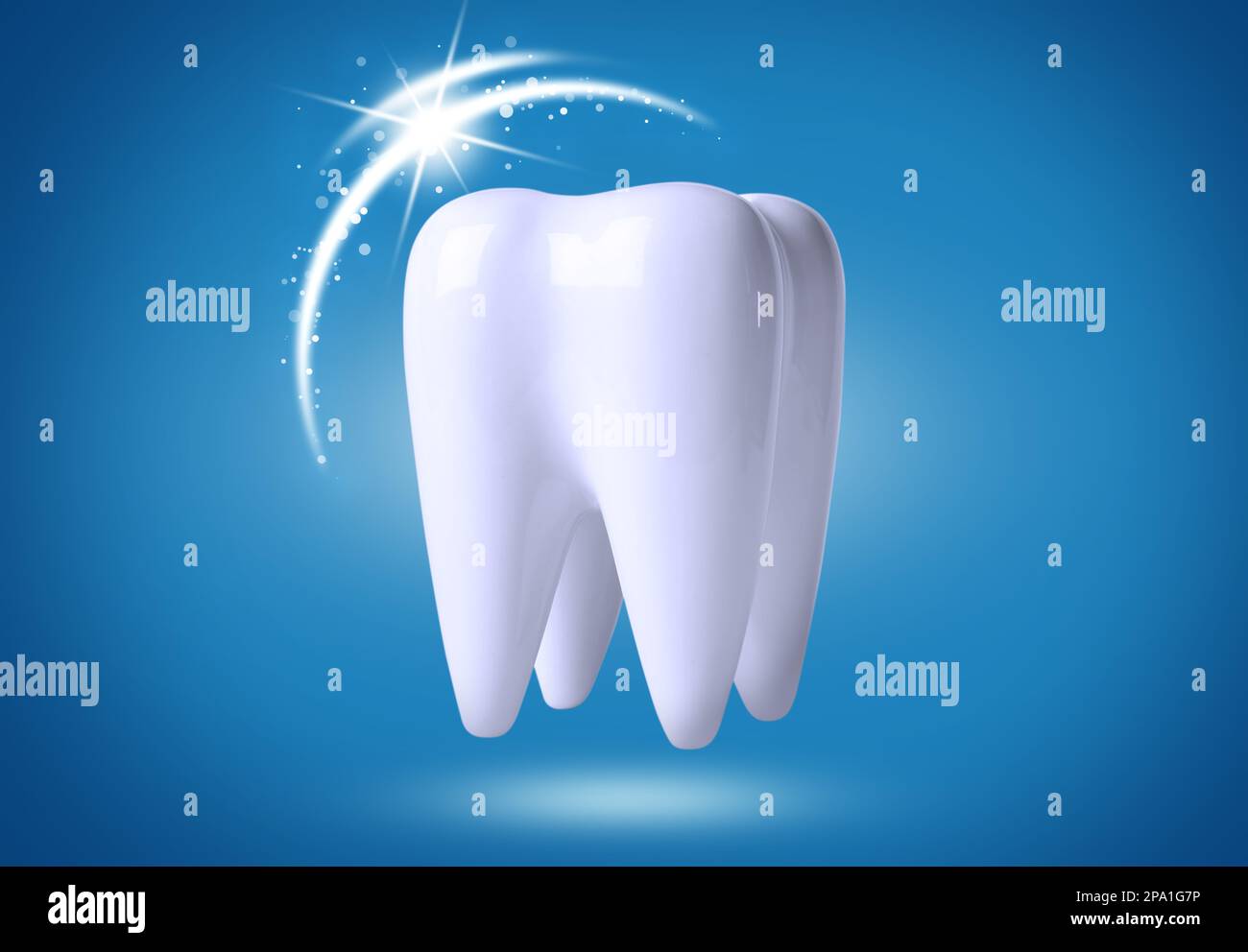 Tooth model with glowing on blue background. Dental care Stock Photo ...