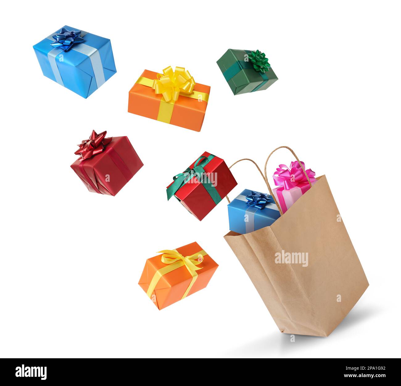 Many different gift boxes falling into paper shopping bag on white ...