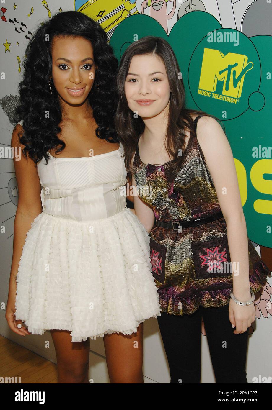Singer Solange Knowles, left, and actress and singer Miranda Cosgrove ...