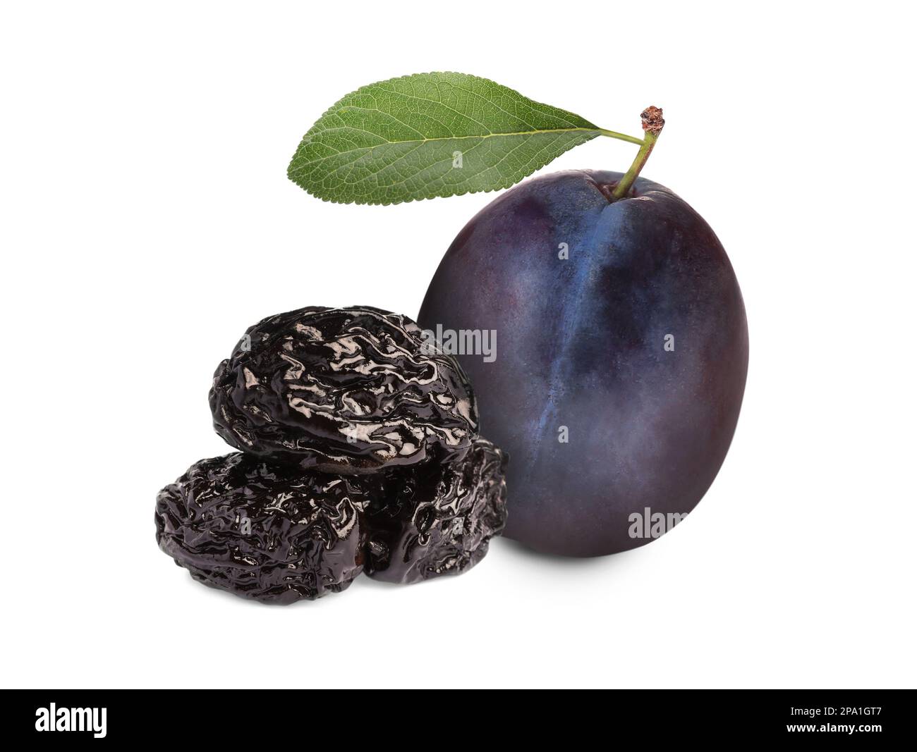Delicious fresh ripe plum and sweet dried prunes on white background ...