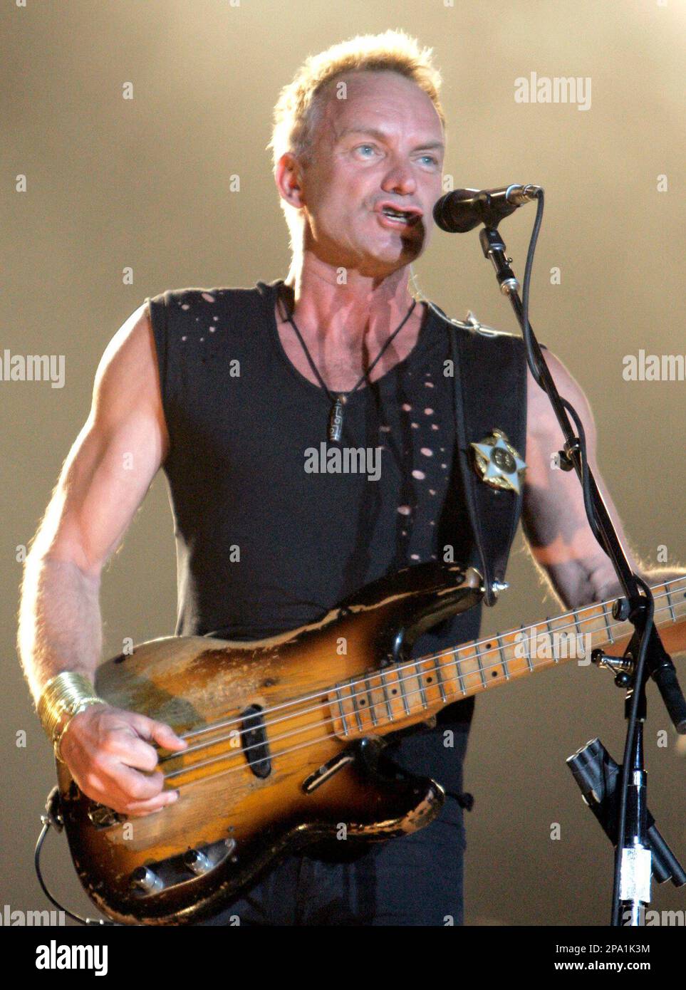 ** FILE ** Lead vocalist and bassist Sting of The Police performs ...