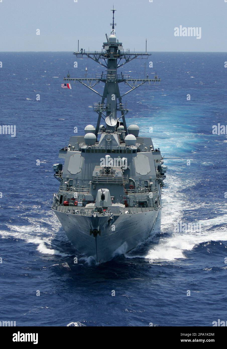 The U.S. Navy destroyer, USS Howard, sails off the coast of Hawaii ...