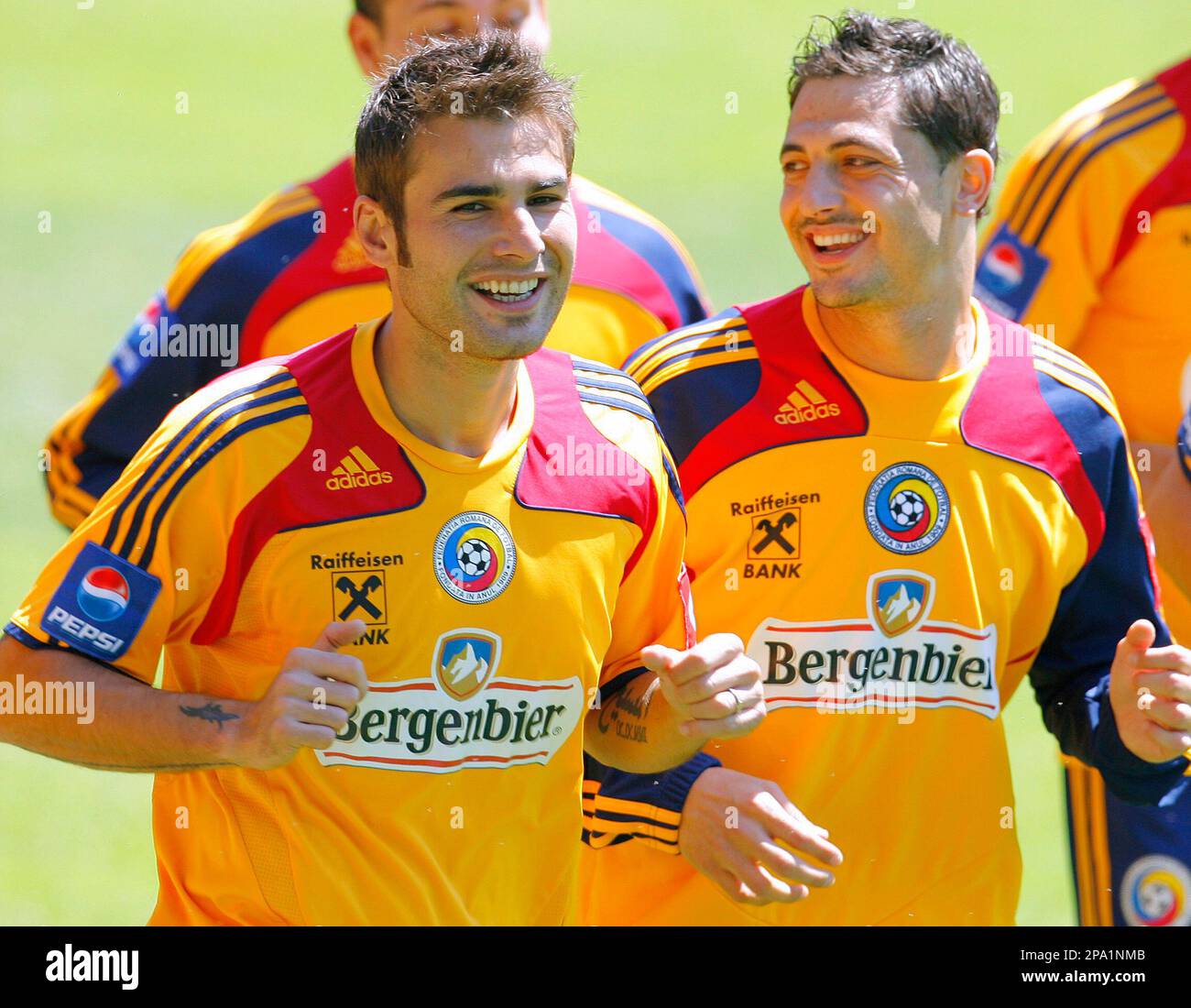 Striker Adrian Mutu, left, and Mirel Radoi, right, are seen during a ...
