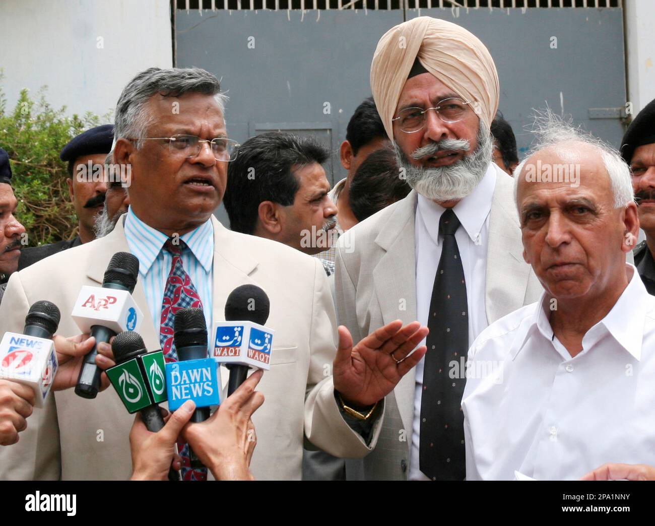 Former Indian Judge, Narender Rai, left, talks to reporters after ...