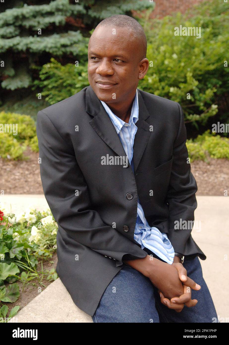 Jerome Verdier, head of the Truth and Reconciliation Commission of Liberia, sits outside at ...