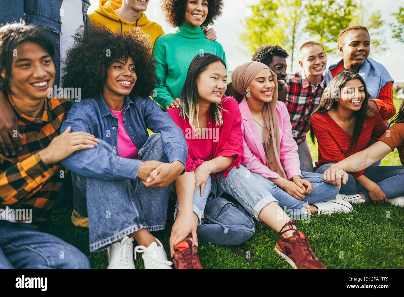Young diverse people having fun outdoor laughing together outdoor ...
