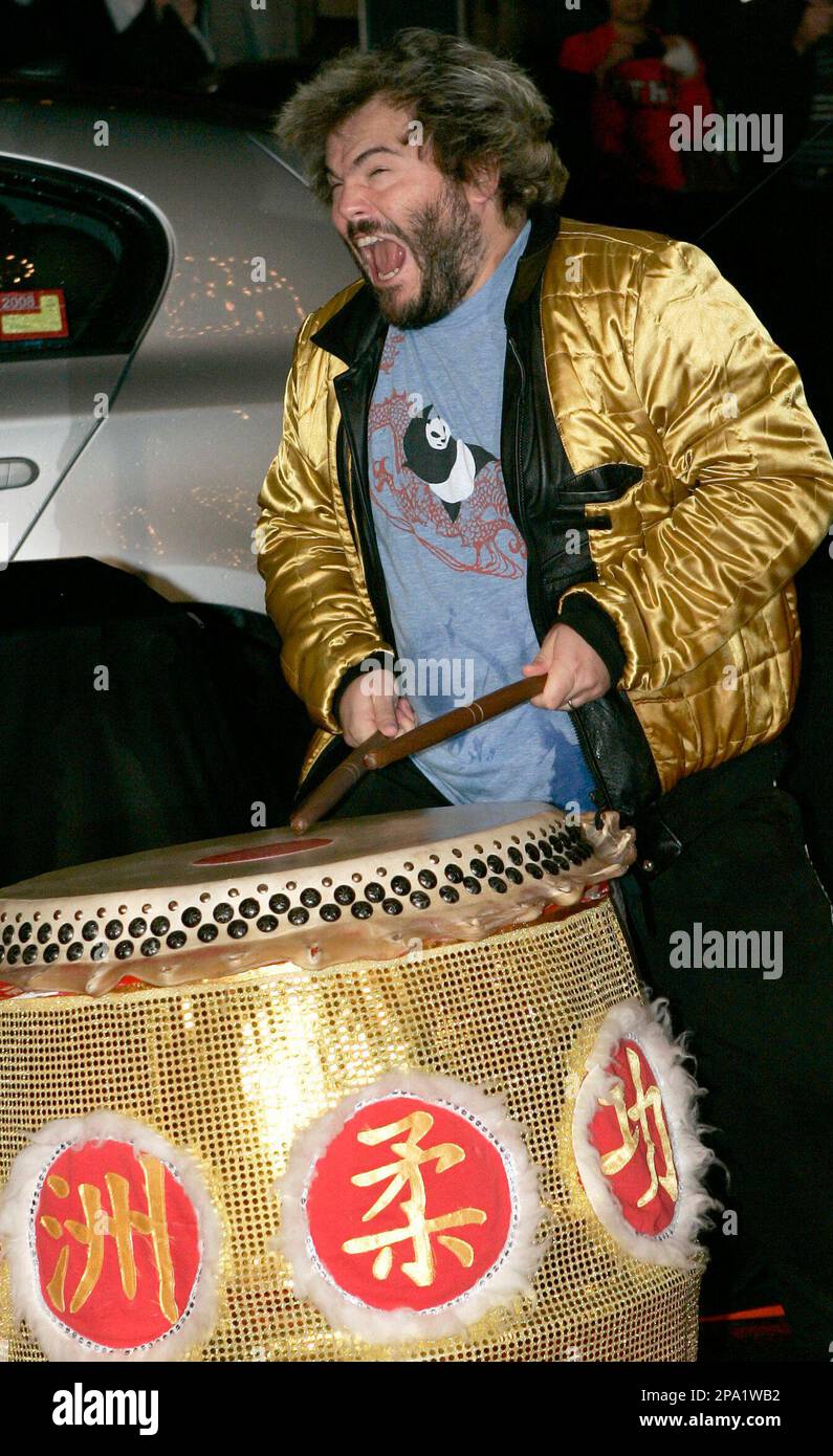 Hollywood actor Jack Black beats a Chinese drum as he arrives for the ...
