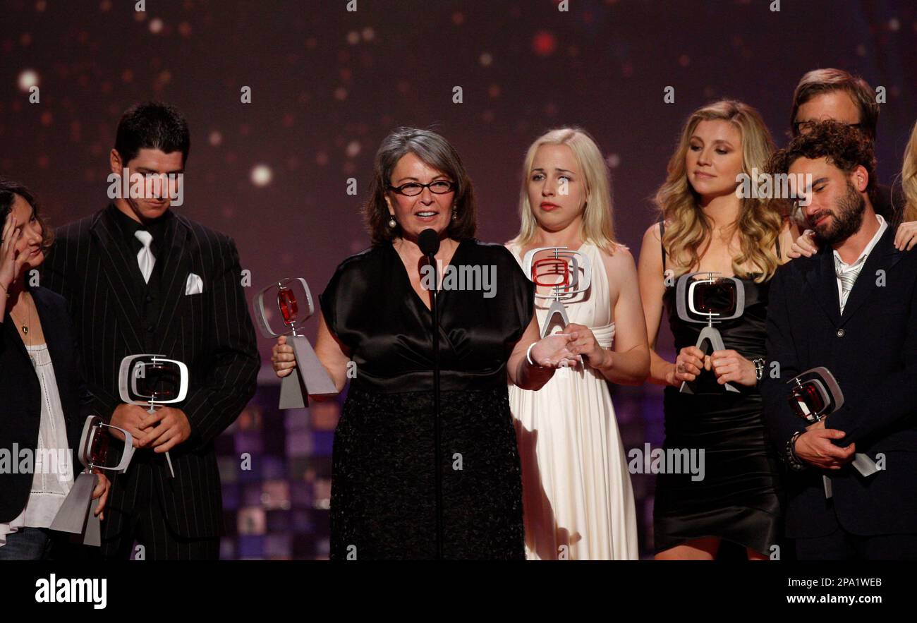 Roseanne Barr, center, and the cast of Roseanne, accept the innovation ...