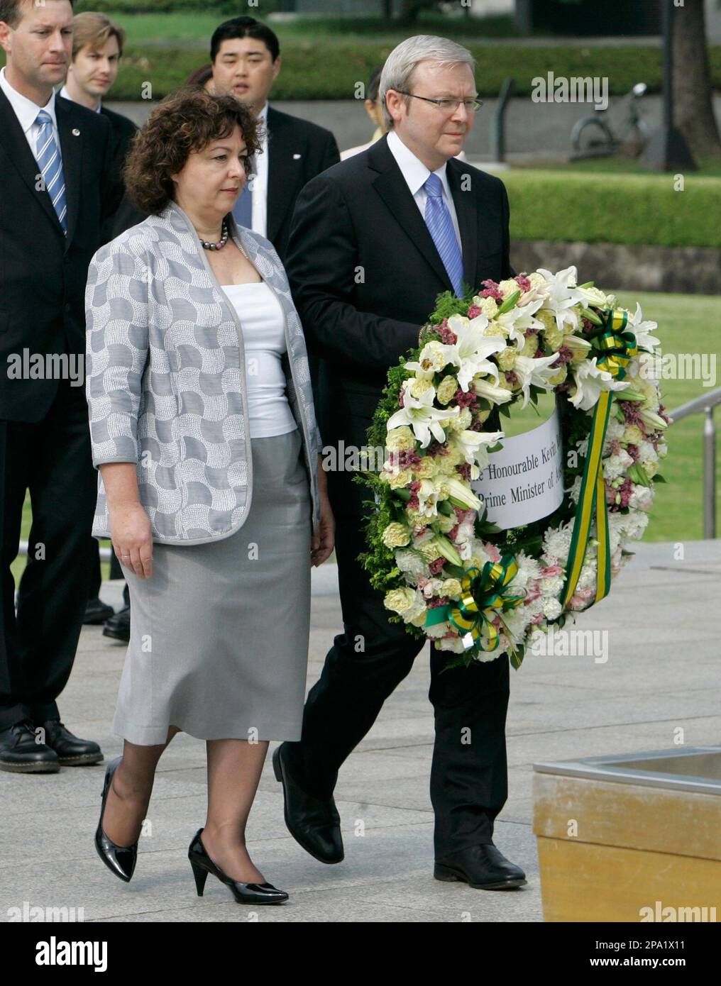 Australian Prime Minister Kevin Rudd with his wife Therese Rein carries ...