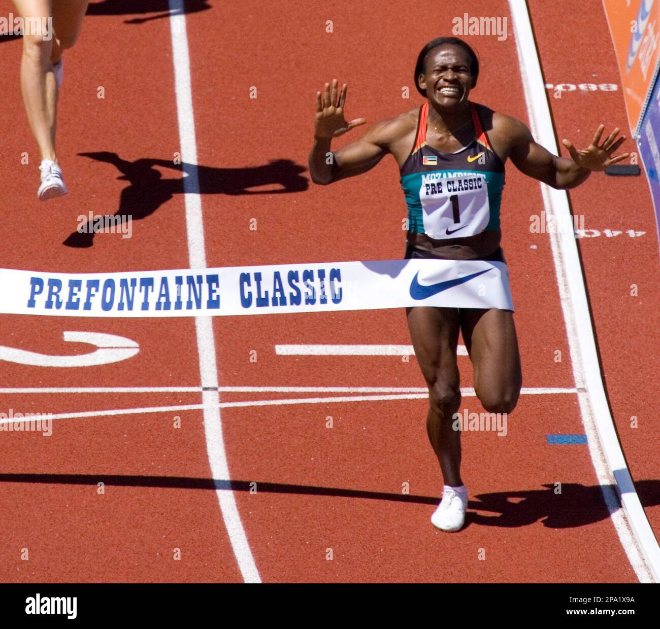 Maria Mutola, from Mozambique, crosses the finish line to win the 800 ...