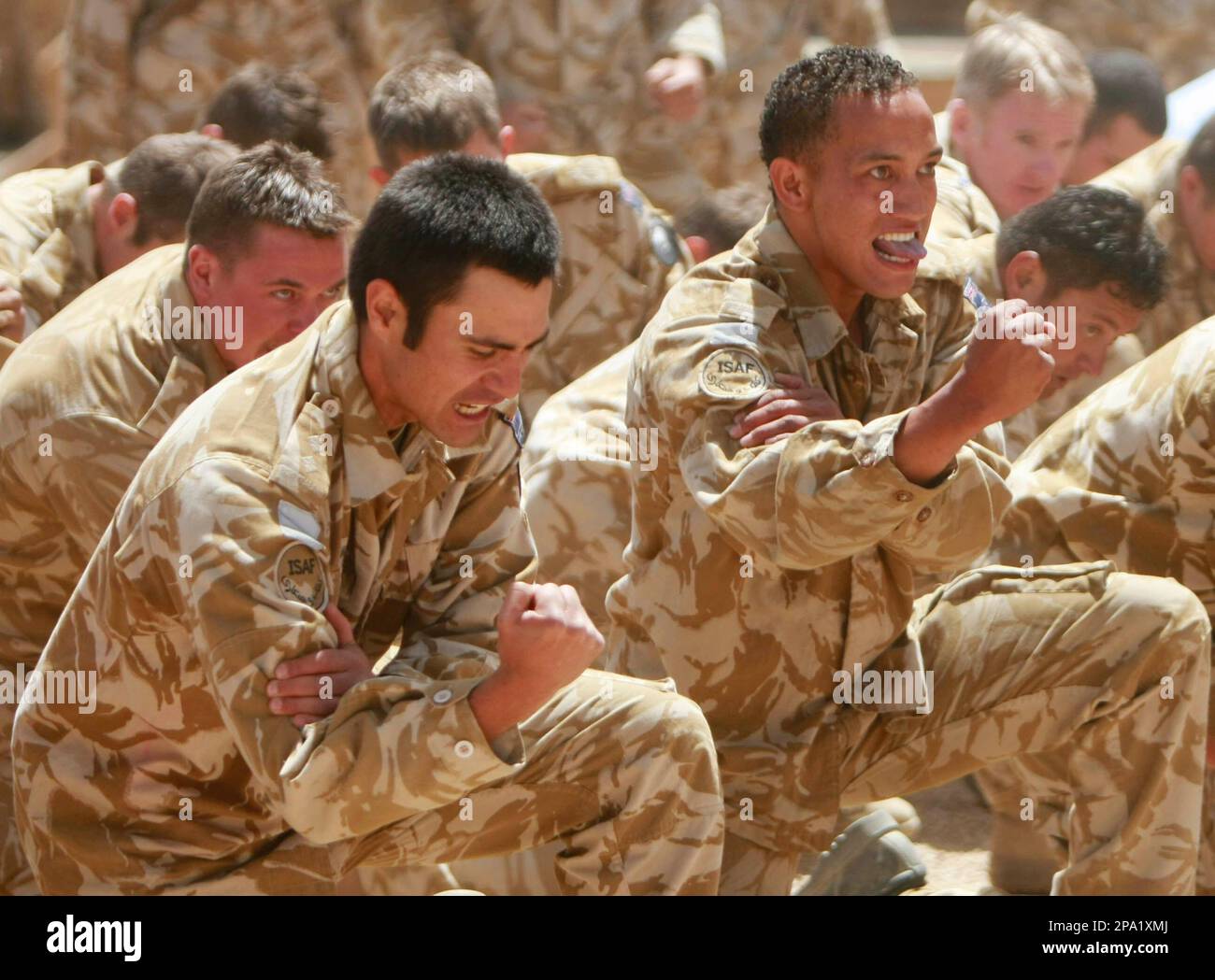 New Zealand soldiers perform the traditional warrior dance, or haka ...