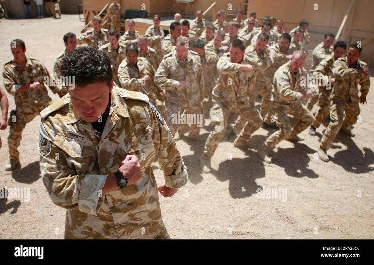 New Zealand soldiers perform the traditional warrior dance or haka ...
