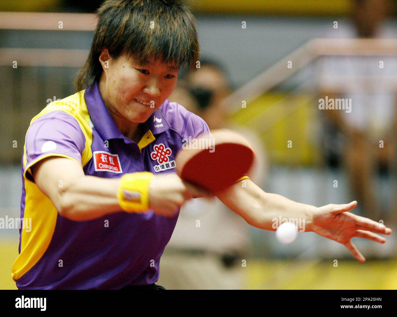 Guo Yan of China returns a shot during the TMS Singapore Open Table ...