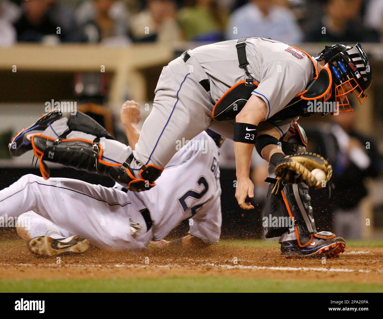 New York Mets catcher Brian Schneider gets the force out at home plate ...