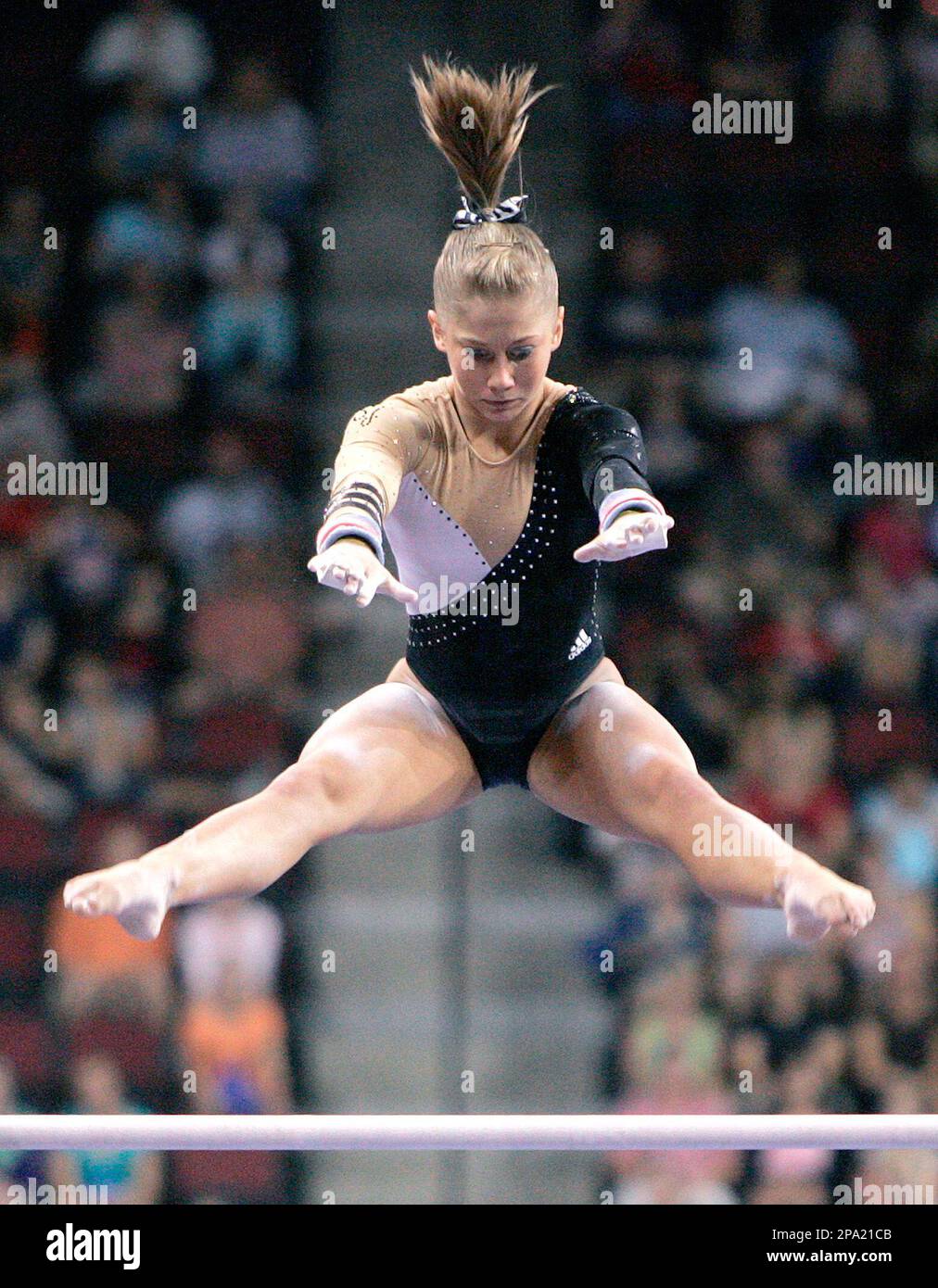 Shawn Johnson competes on the uneven bars at the U.S. Gymnastics ...