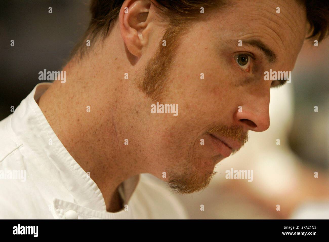 **ADVANCE FOR SUNDAY, JUNE 8** Chef Grant Achatz looks across the Alinea Restaurant kitchen at ...