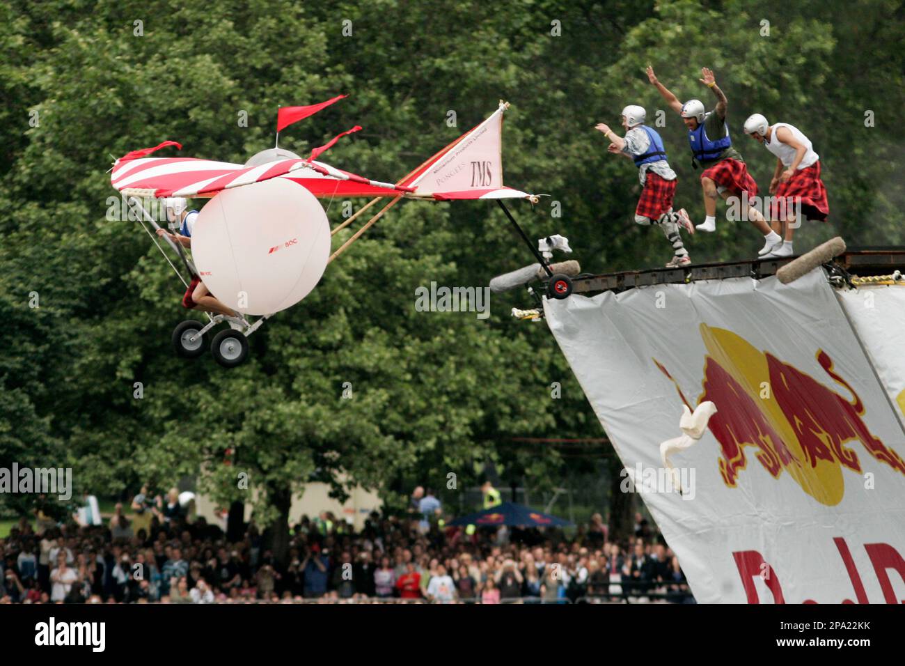 Flying team 'The Barnsbury Mob' fly off a ramp on Serpentine Lake in ...