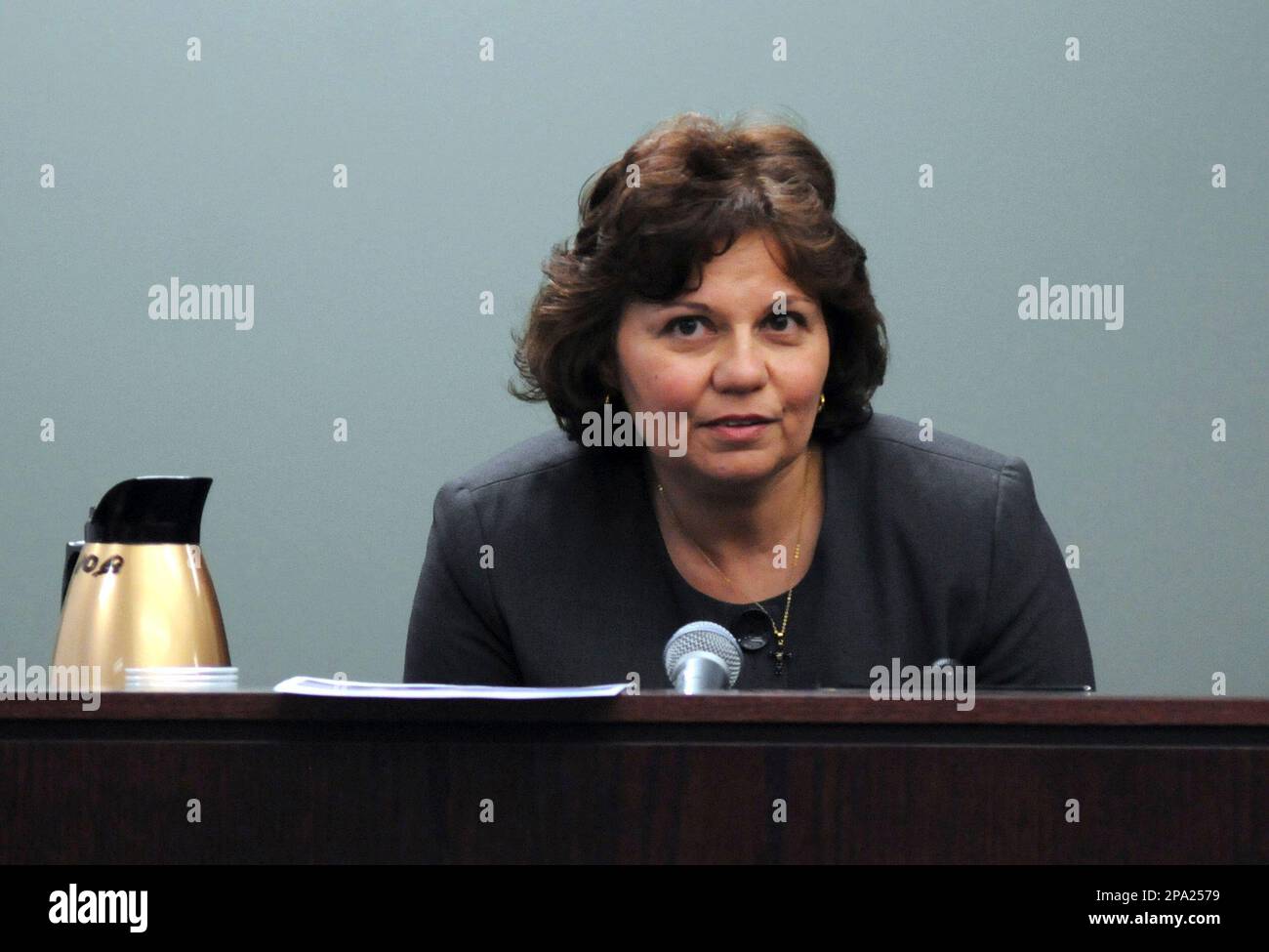 Theresa Ann Pratt, second witness to be called, listens on the witness ...