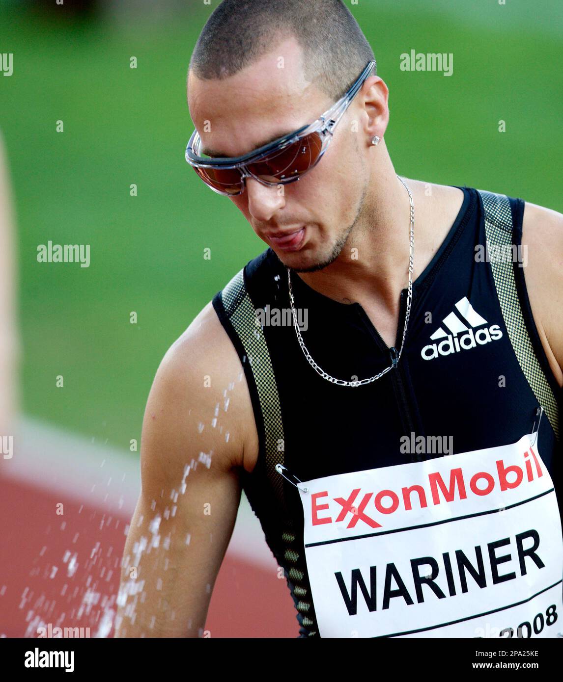 Jeremy Wariner, USA, enjoys a splash of water after winning the 400m ...