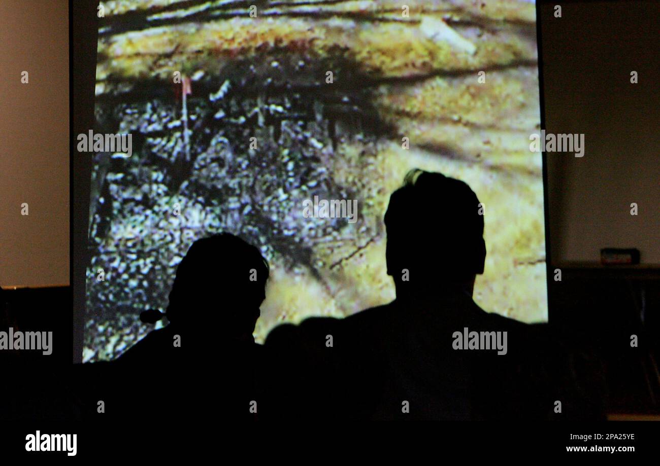 Defense attorneys watch an evidence video taken at the LaBarre farm ...