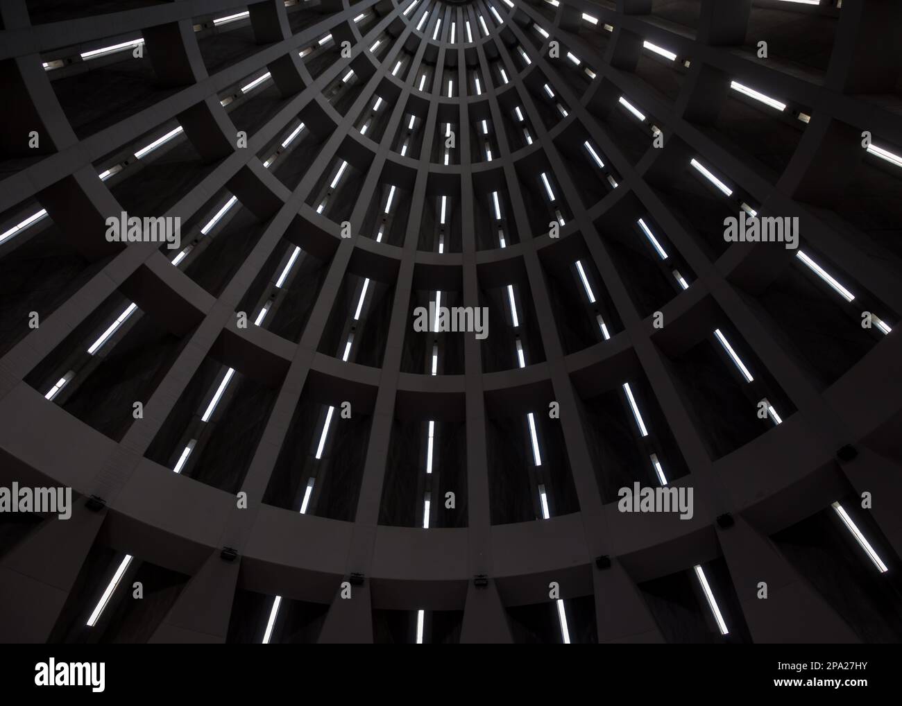 Detail of the ceiling of a modern building. Lines in prespective shaped ...