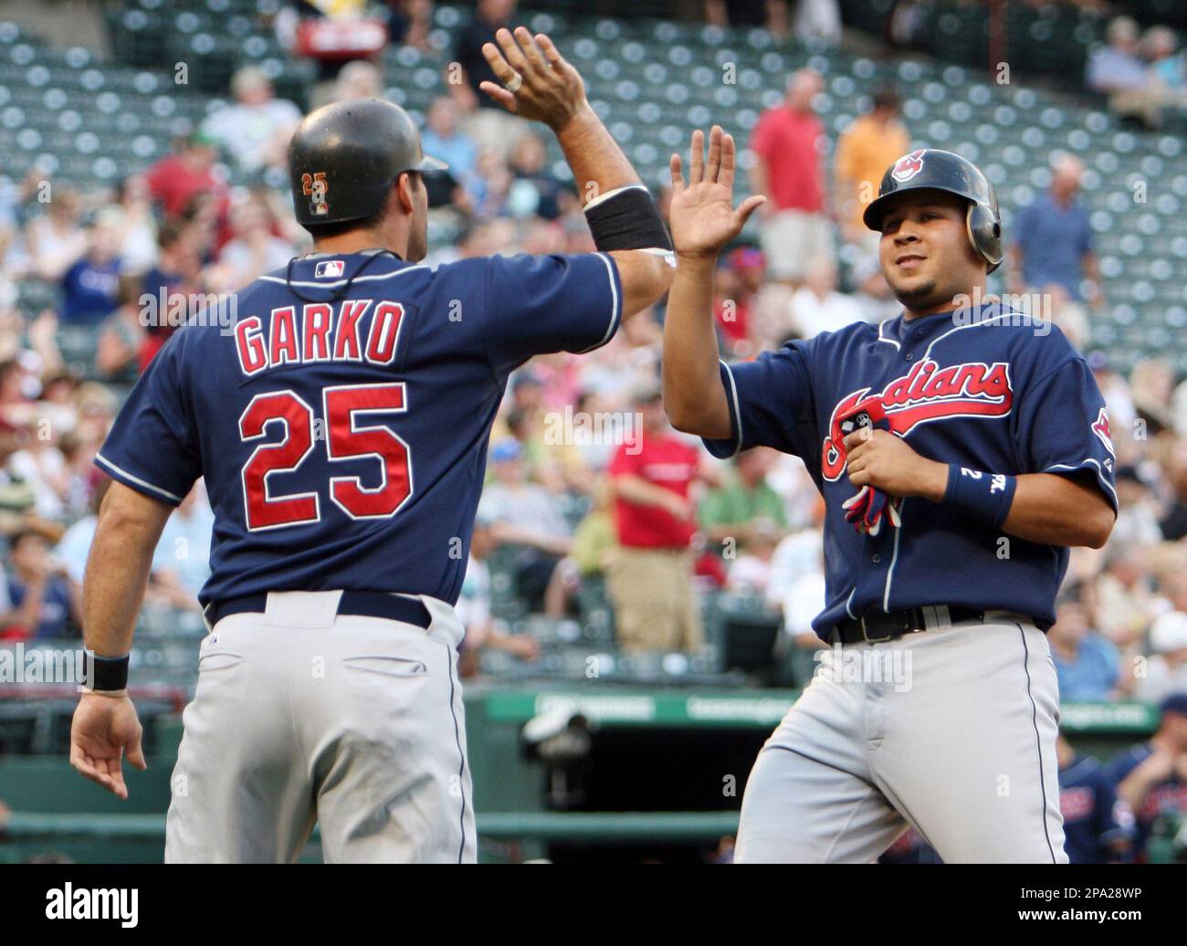 Cleveland Indians' Ryan Garko, left, and Jhonny Peralta congratulate ...