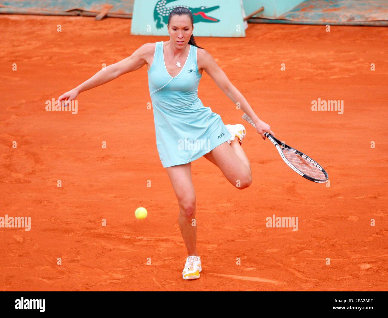 Serbia's Jelena Jankovic kicks the ball as she plays compatriot Ana ...